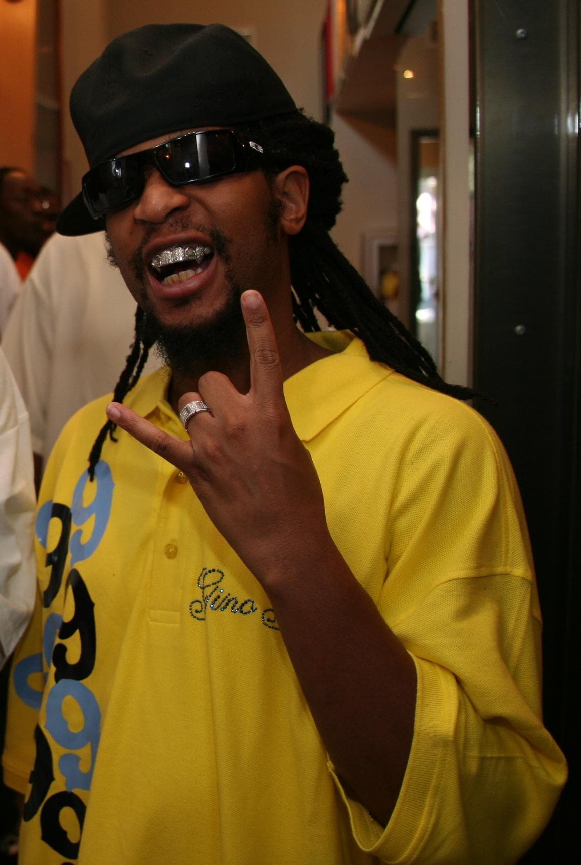 18 Rappers Who Wear Grills