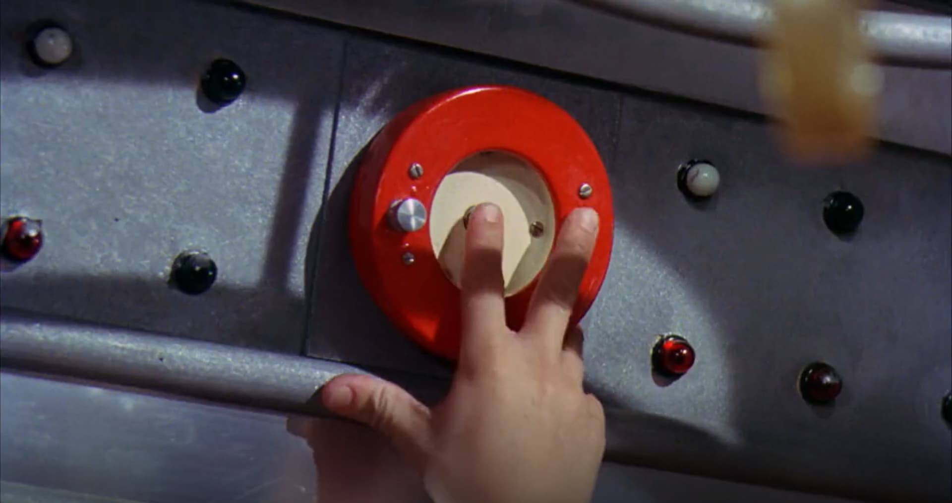 14 Times Movie Characters Actually Press The 'Big Red Button'