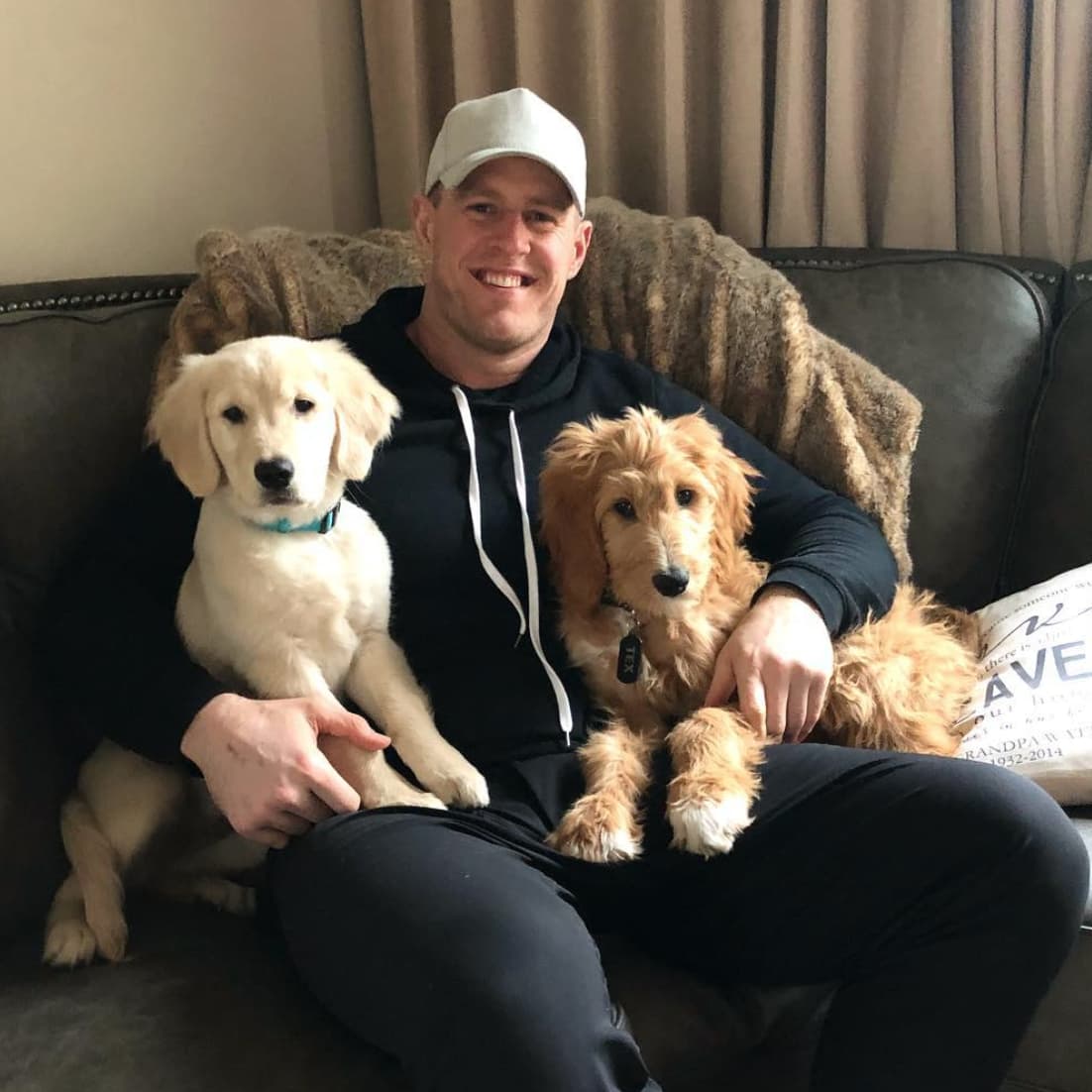 17 Adorable Pics Of NFL Players With Small Dogs, Ranked By Cuteness