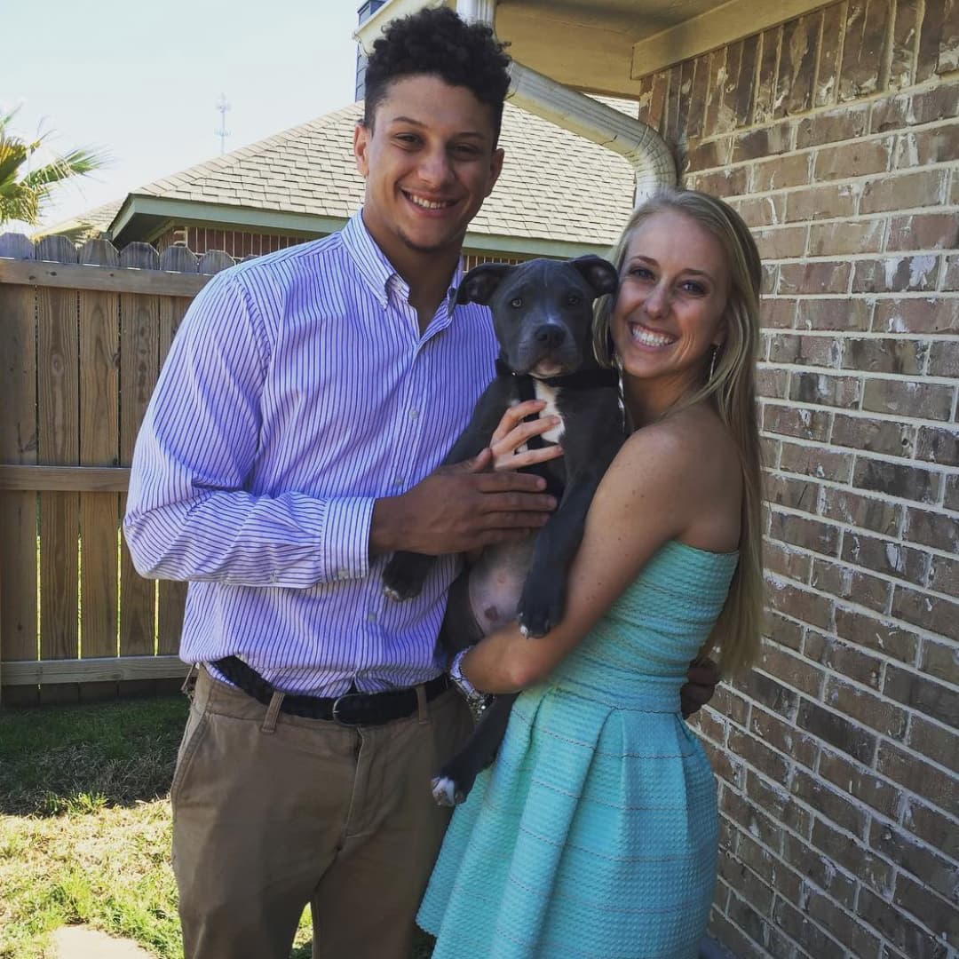 17 Adorable Pics Of NFL Players With Small Dogs, Ranked By Cuteness