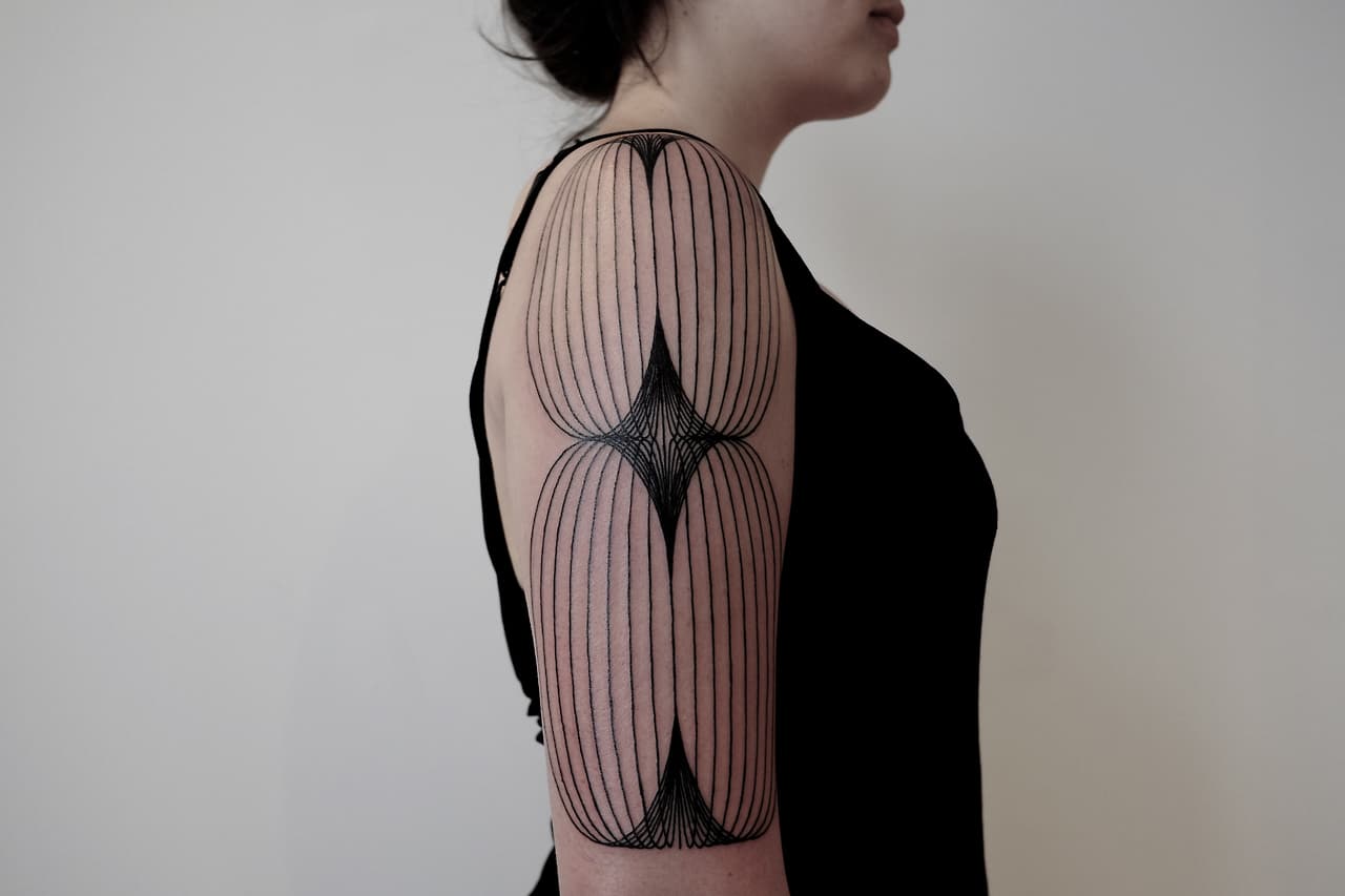 Cool Geometric Tattoos Designs & Ideas