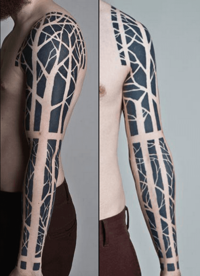 Blackout Tattoos Photos & Solid Black Tattoo Ideas