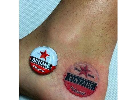 24 People Who Got Alcohol Logo Tattoos for Some Reason
