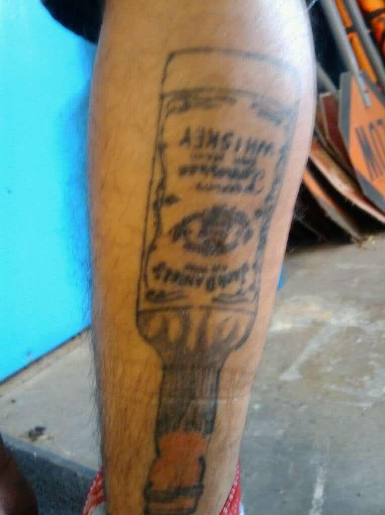 24 People Who Got Alcohol Logo Tattoos for Some Reason