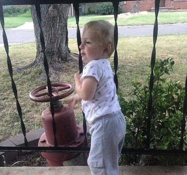 23 Hilarious Pictures Of Children With Their Heads Stuck In Things