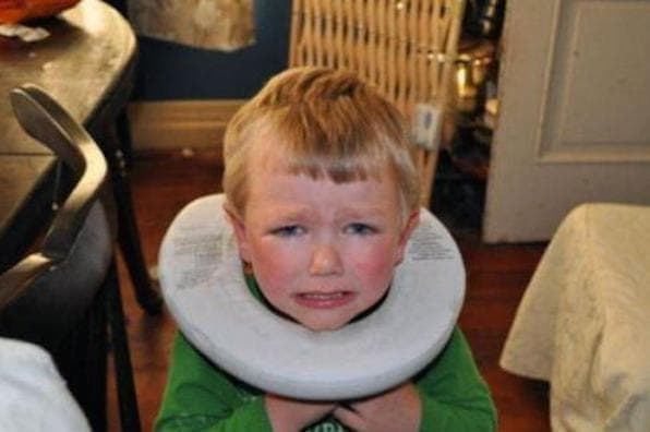 23 Hilarious Pictures Of Children With Their Heads Stuck In Things