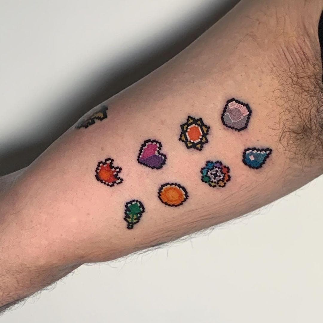 22 Subtle Pokémon Tattoos We Would Totally Get