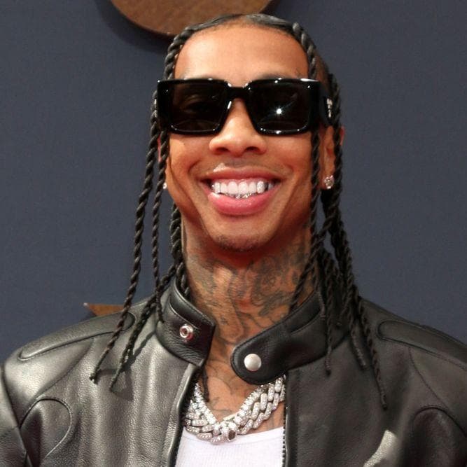 17 Rappers With Neck Tattoos