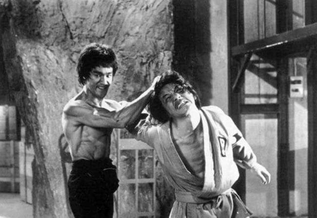 30 Famous Actors Who Started As Extras, Ranked